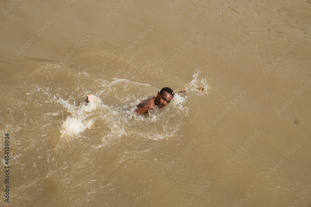 person on the water Stock Photo | Adobe Stock