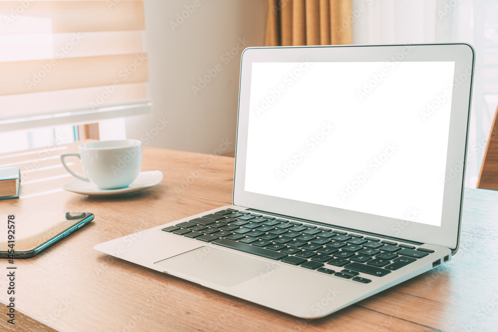 Laptop computer blank empty mock up screen in home office interior ...