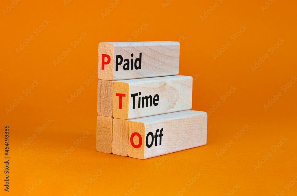 PTO, Paid time off symbol. Wooden blocks with concept words 'PTO, Paid ...