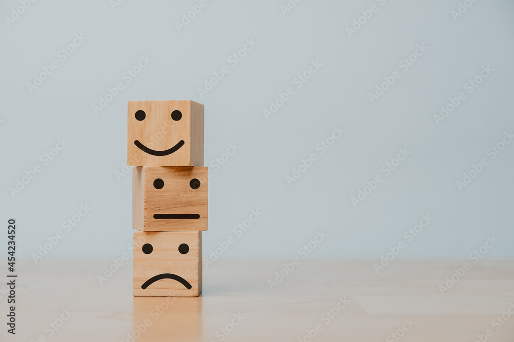 Wooden blocks with happy face smile face symbol symbol on the table ...