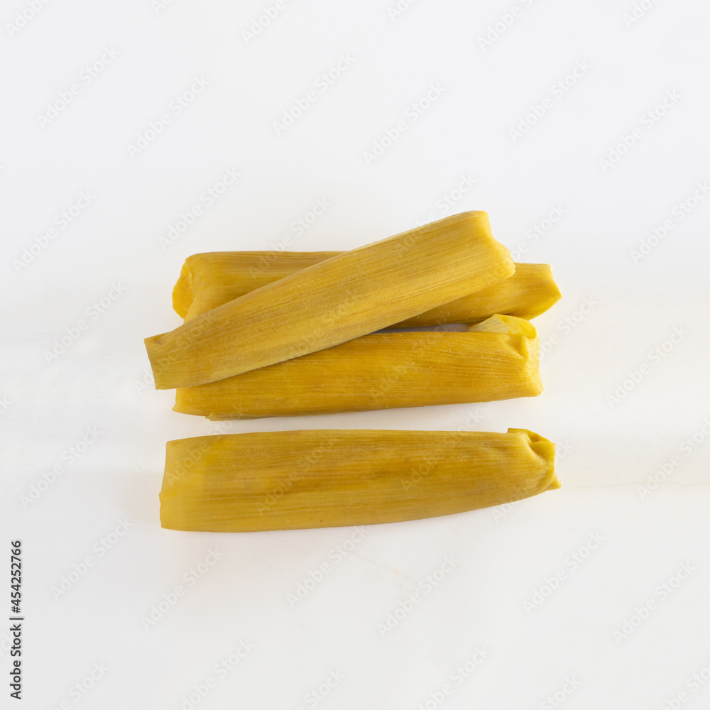 Traditional Latin American food, corn humitas on white background. Copy ...