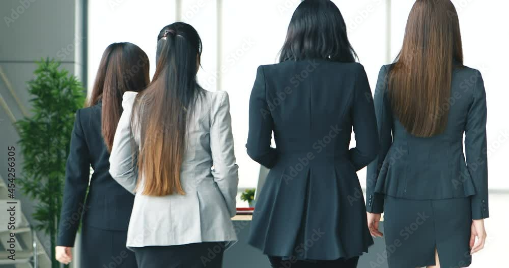 Back view angle, group of young and cute colleagues new employees in ...