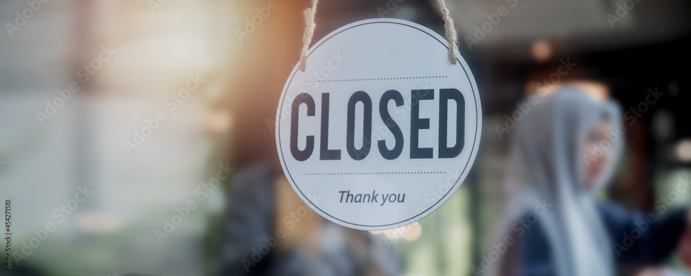 Closed sign in front of door café and shop, new normal and start ...