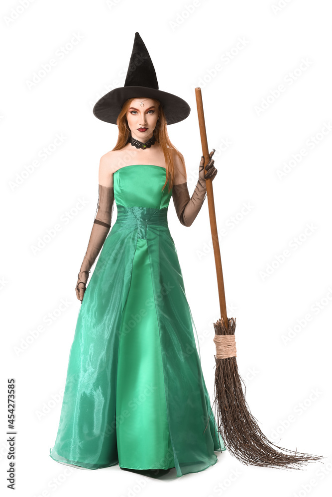 Beautiful woman dressed as witch for Halloween on white background ...