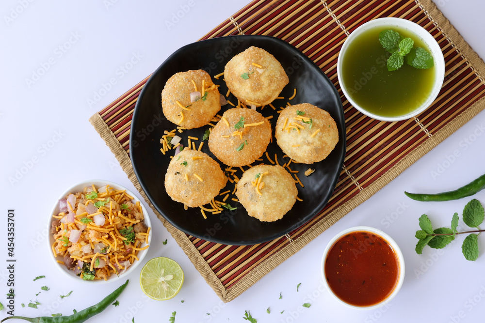 Girl women taking spicy Pani puri golgappe with hand, Chat item, India ...