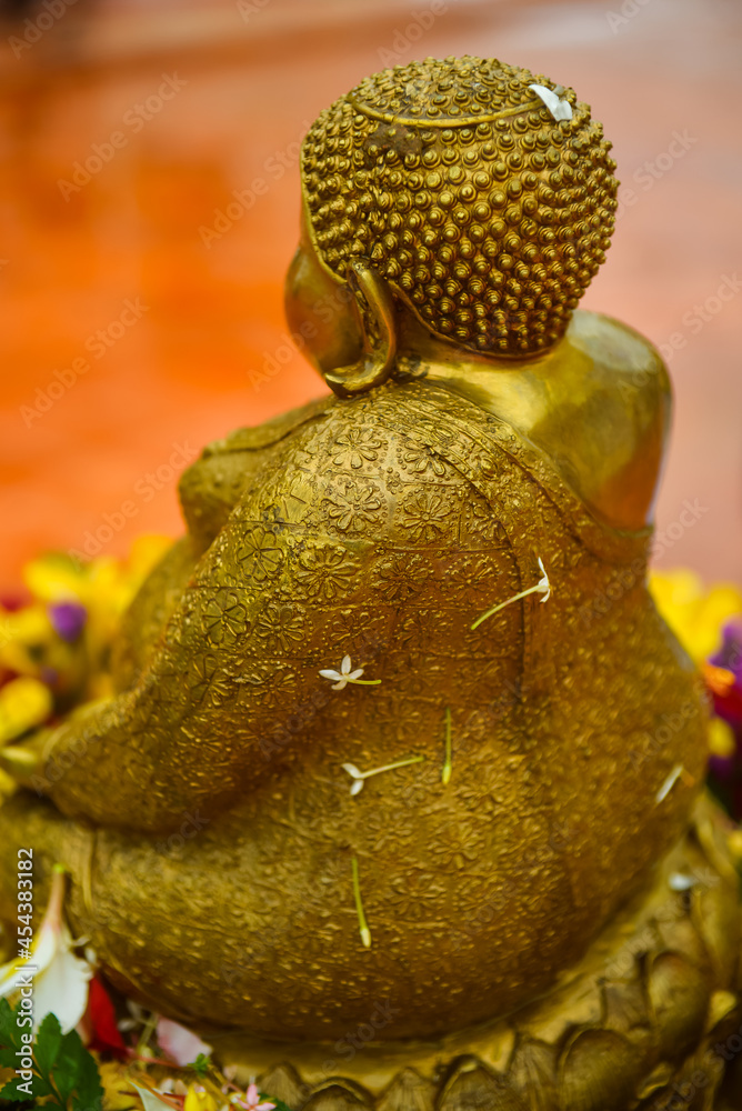Golden fat Buddha statue in a Thai buddhist temple. Buddhism official ...