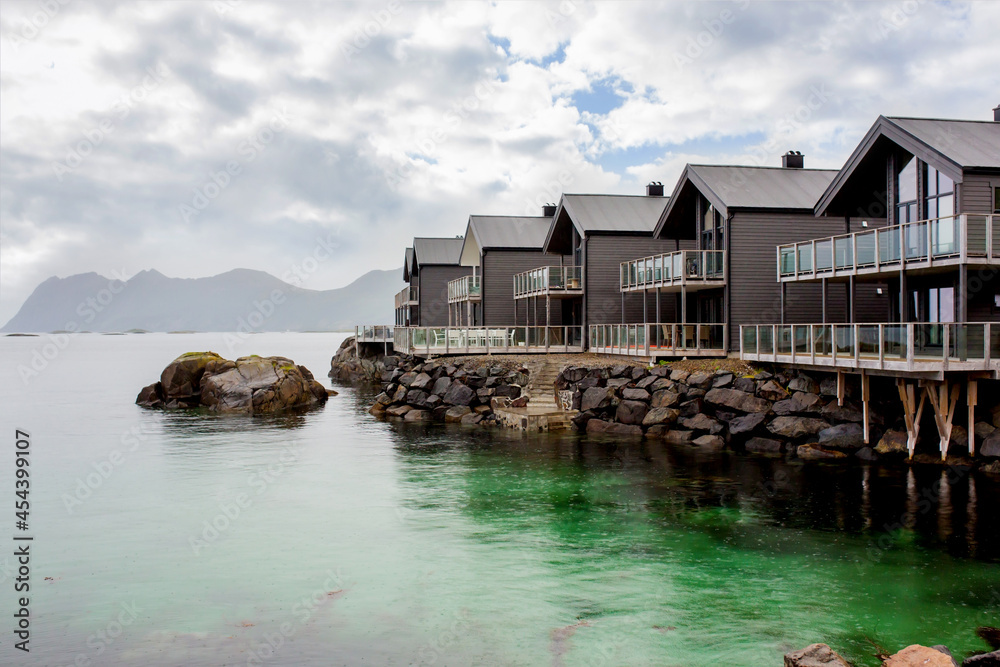 Beautiful houses in a row in a little village called Hamn i Senja on ...
