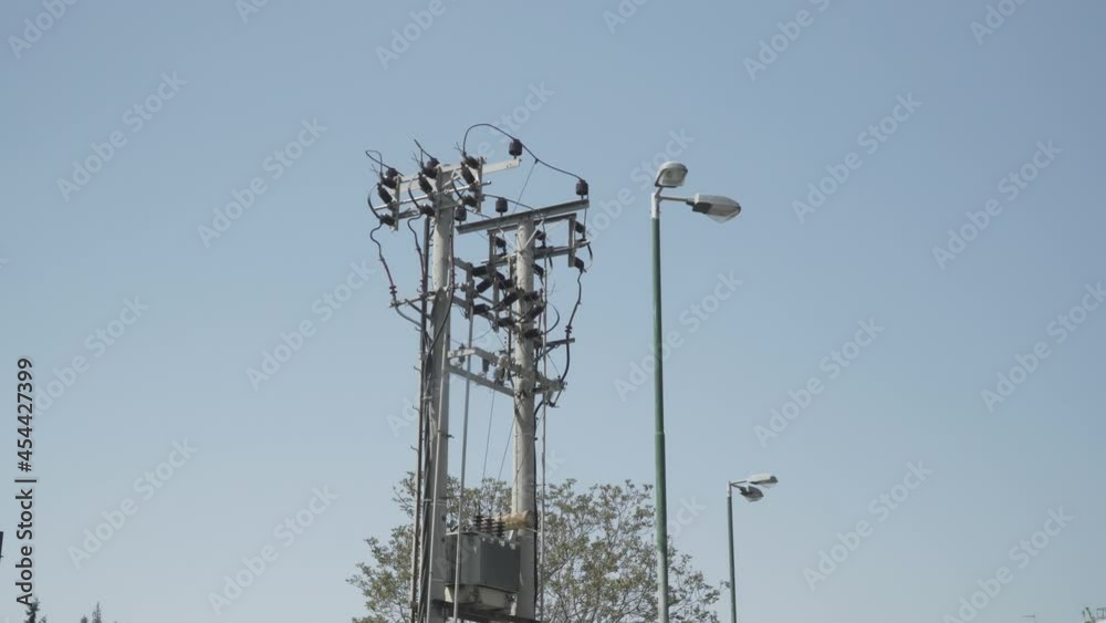 Urban external power voltage distribution transformer on a power column ...
