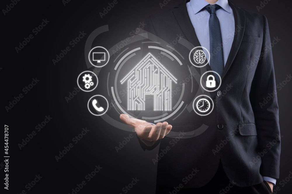 Businessman hold house icon.Smart home controlled, intelligent house ...