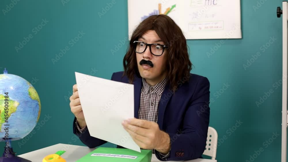 Funny angry school teacher with a mustache wearing glasses at a ...