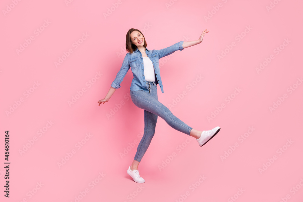 Full length body size photo girl smiling dancing wearing jeans outfit ...