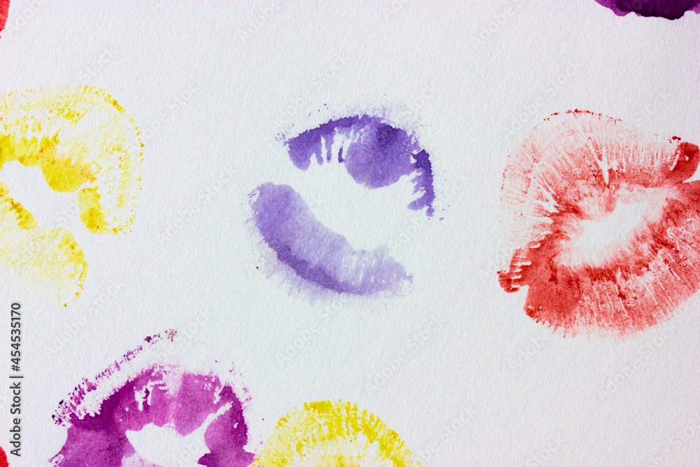 Set of multicolored female lip prints on white paper background top ...
