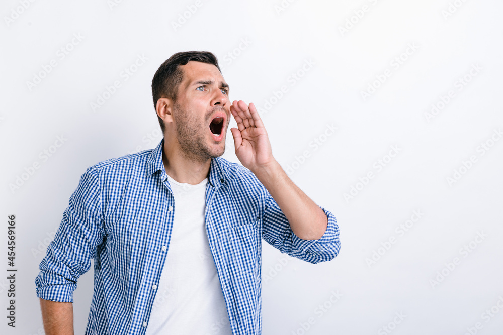 Attention, important message! Side view of aggressive man yelling loud ...