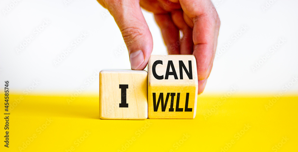 I can and will symbol. Businessman turns a cube and changes words i can ...