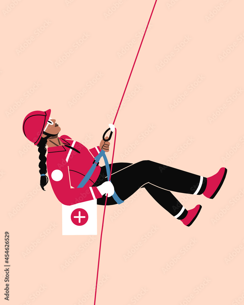 Rappelling professional search and rescue. Female with first aid kit ...