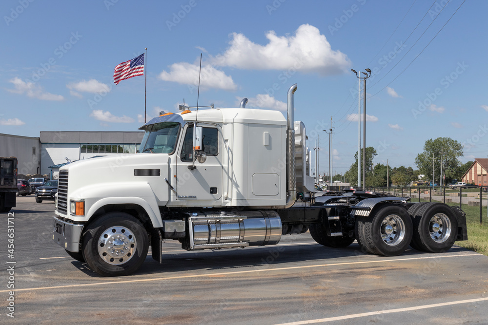 Mack Semi Tractor Trailer Trucks Lined up for sale. Mack Trucks is ...
