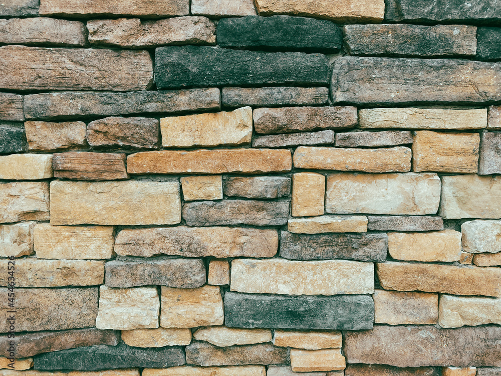 stone brick building facade wall cut and irregular shapes rock ...