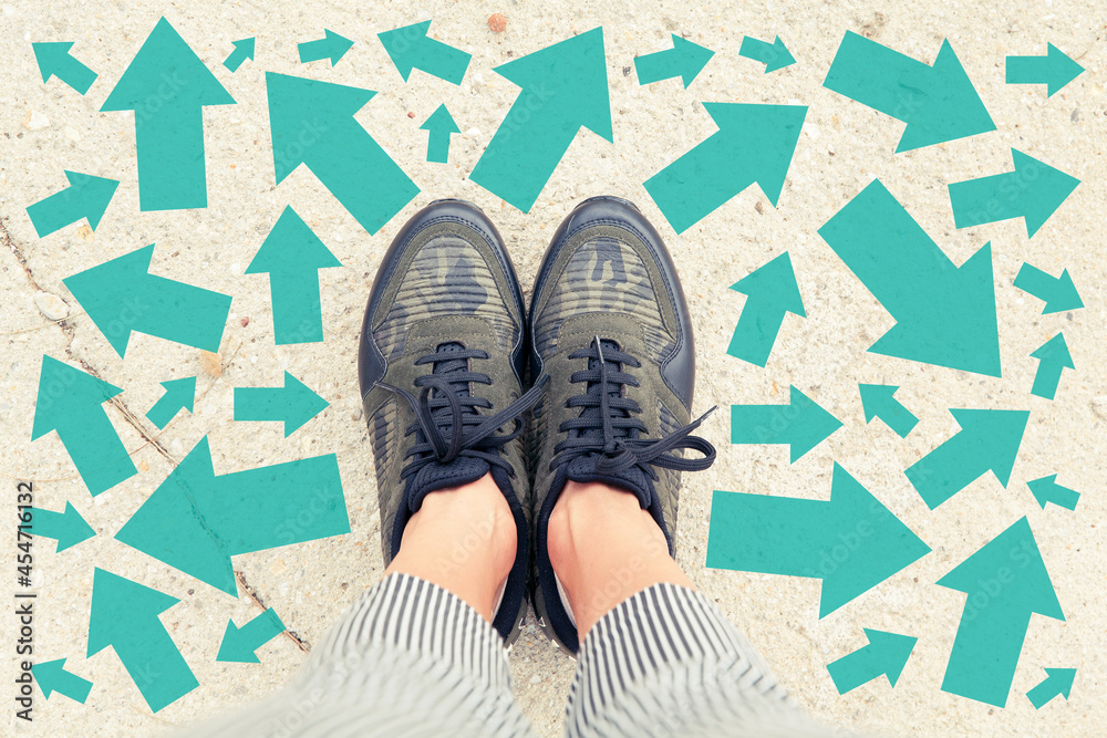 Making decisions in life / Choosing your path concept with feet and ...