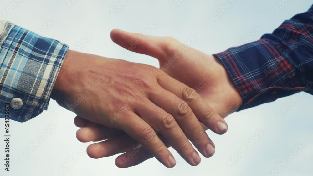 teamwork handshake concept. two people shake hands shaking hands ...