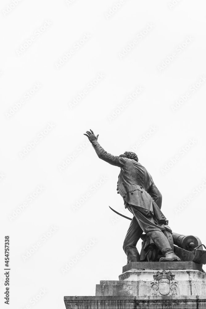 Monochromatic photo of the statue of the famous artillery captain named ...
