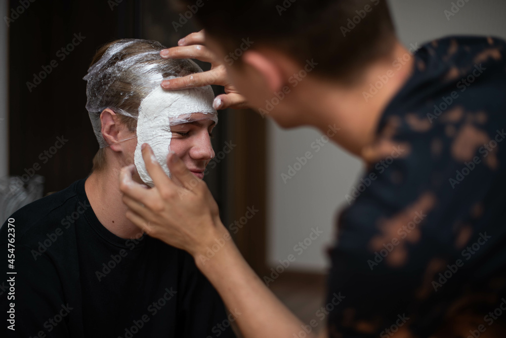 The process of making a plaster mask at home. creating masks based on a ...