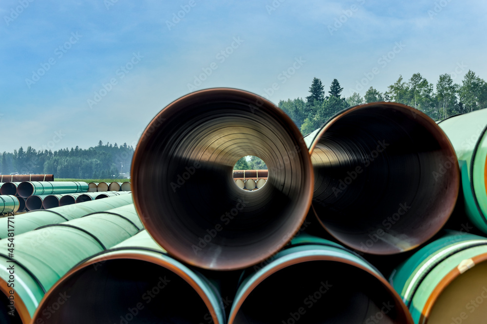 Pipe lengths for a crude oil pipeline in a storage yard in Alberta ...