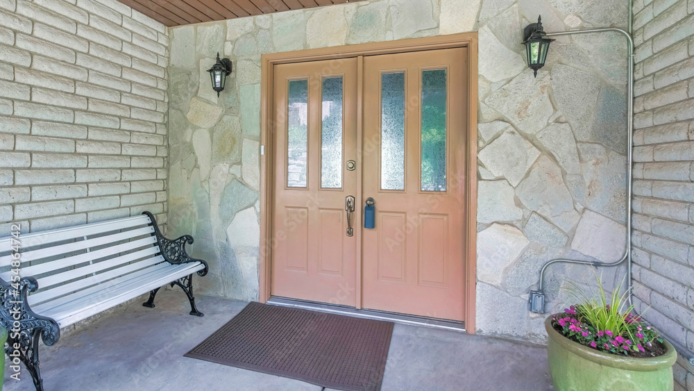 Pano Glass paned double front door of house with modern lockbox for ...