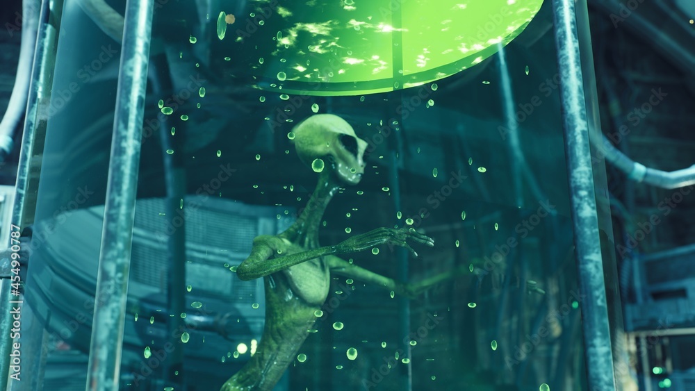 An alien float in a green gurgling liquid in a special glass aquarium ...