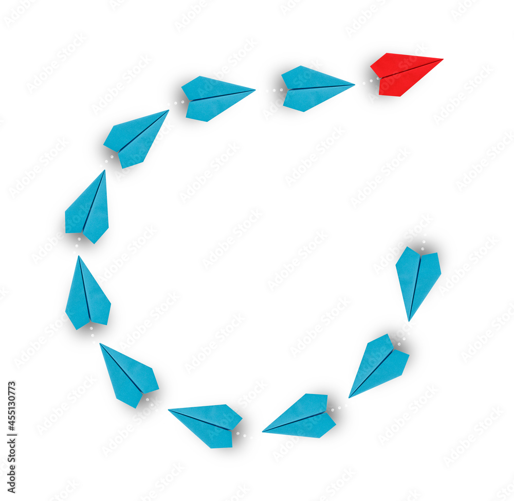 Red paper plane leading a group of blue paper planes changes direction ...