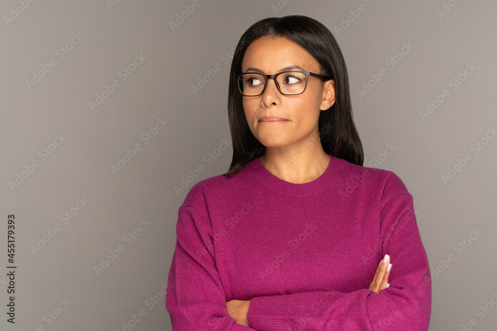 Puzzled and confused african woman look side at copy space pensive ...