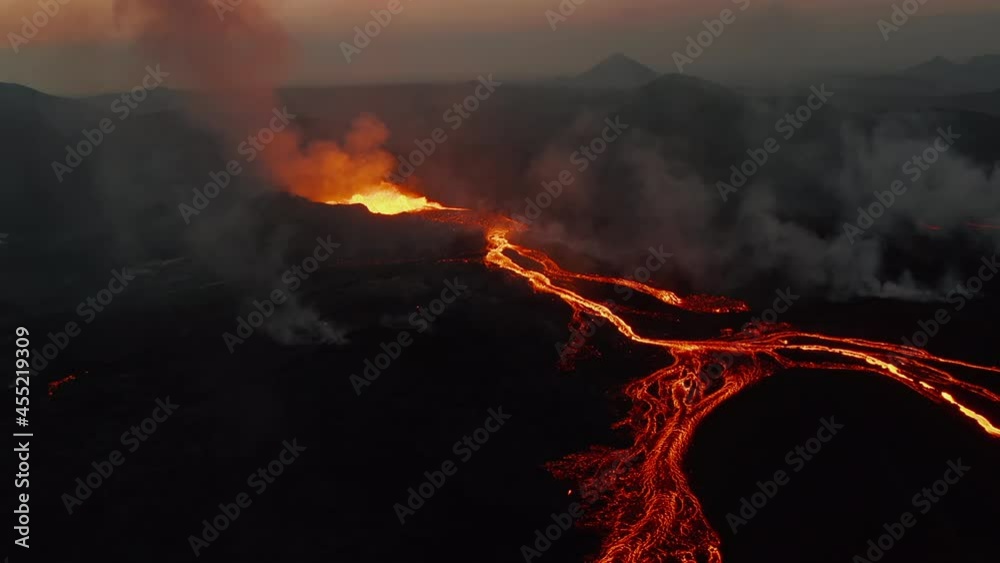 Slide And Pan Footage Of Lava Show At Active Volcano Eruption Flowing