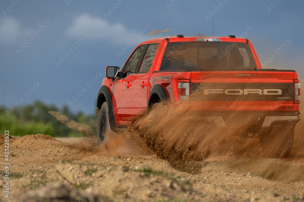New Ford F-150 Raptor during fast driving in extreme wilderness Stock ...