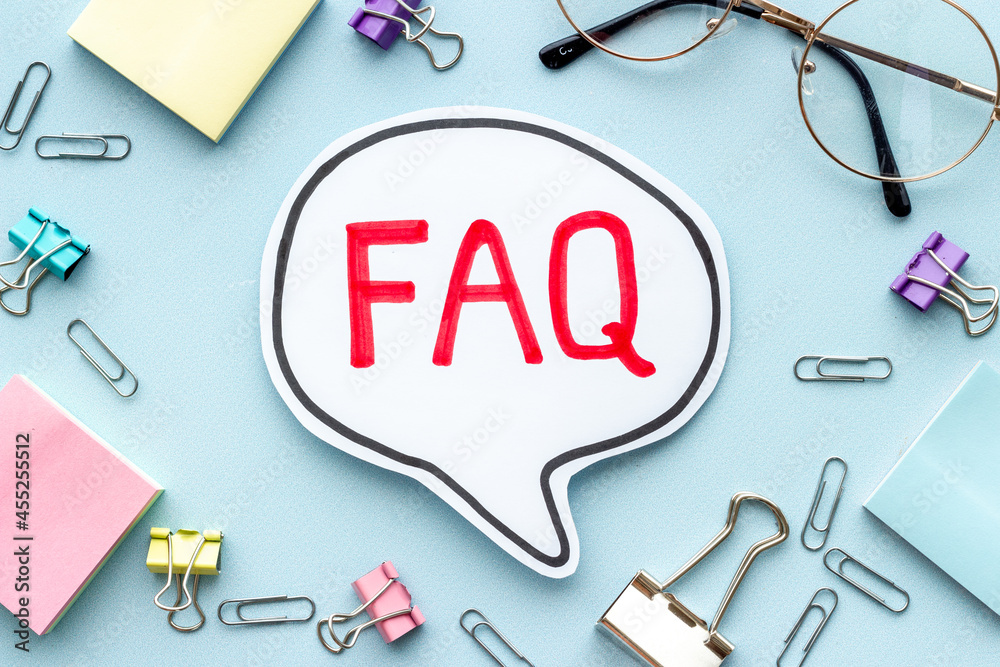 Word faq frequently asked questions with stationery on working place ...