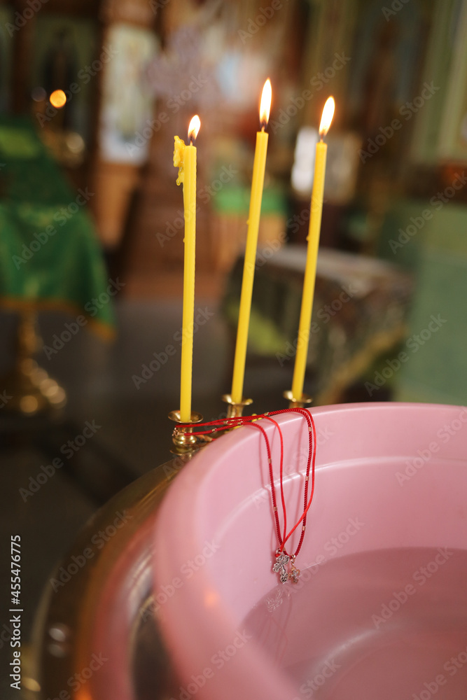 consecration of crosses with holy water in the church Stock Photo ...
