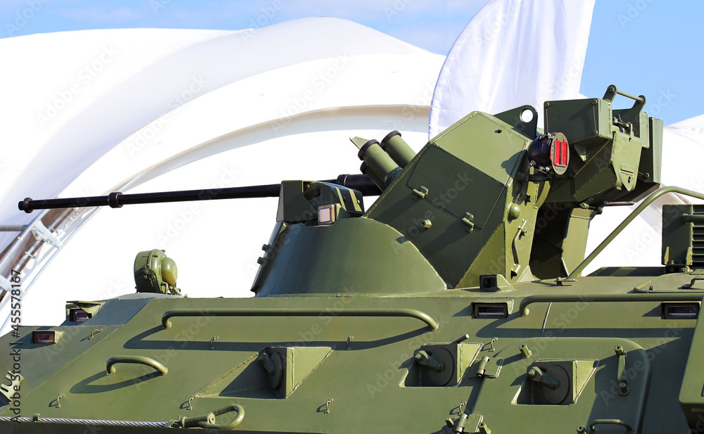 Automatic cannon and machine gun on the turret Stock Photo | Adobe Stock