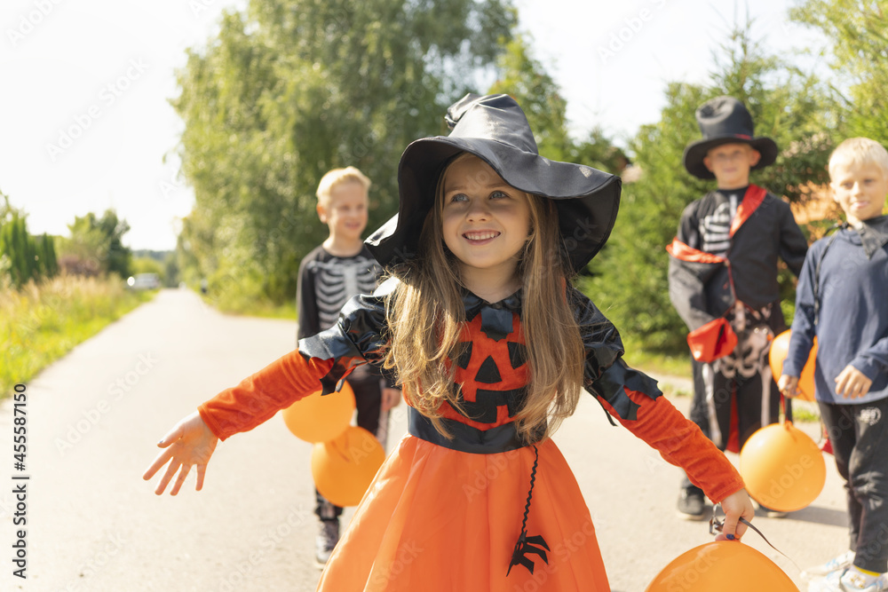 Halloween kids going to collect candy. Trick-or-treating. Guising. Jack ...