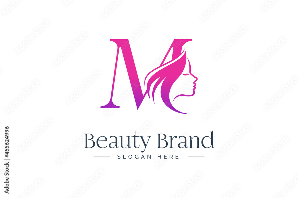 Letter M beauty logo design. Woman face silhouette isolated on letter M ...