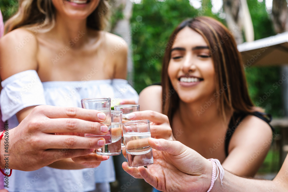 tequila shot, Group of Young latin Friends Meeting For tequila shot or ...