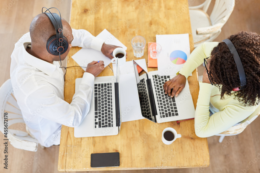 Business people working together on laptop computer online Stock Photo ...