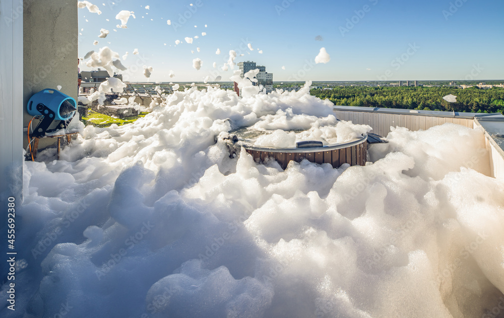 Foam party on the outdoor terrace of modern luxury apartments. Stock ...