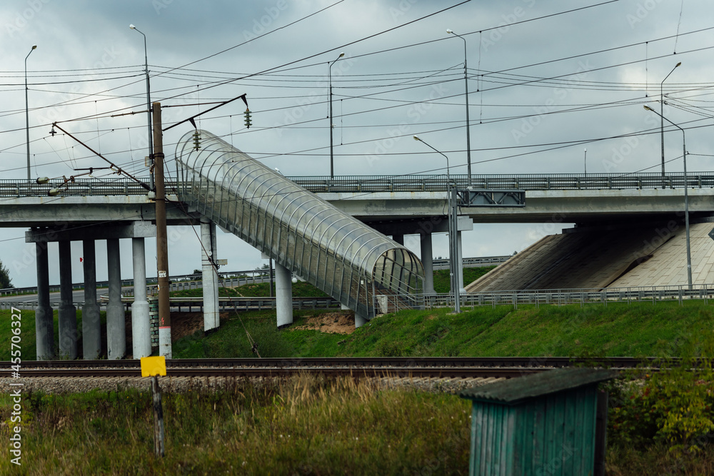 aboveground pedestrian crossing. stairs for people to cross over ...