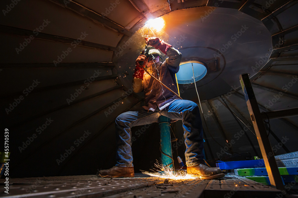 Poster Welding male worker metal arc is part roof tank dome inside ...