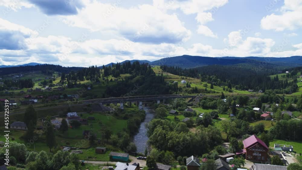 The viaduct in Vorokhta is a railway stone arch bridge across the Prut River aerial view Stock ...