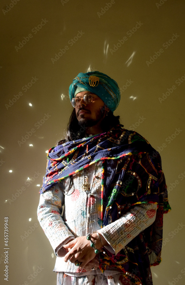 Man wearing traditional Indian outfit and turban Stock Photo | Adobe Stock