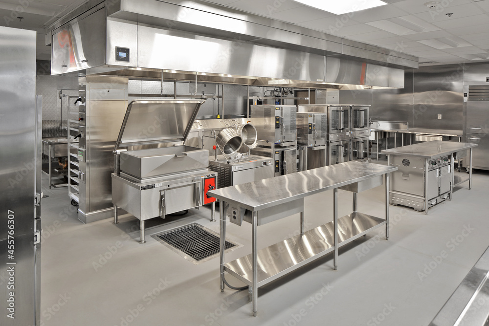 Interior of modern restaurant cafeteria hotel kitchen with stainless ...
