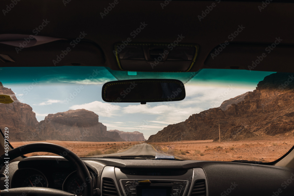 Inside of car driving on road between hills Stock Photo | Adobe Stock