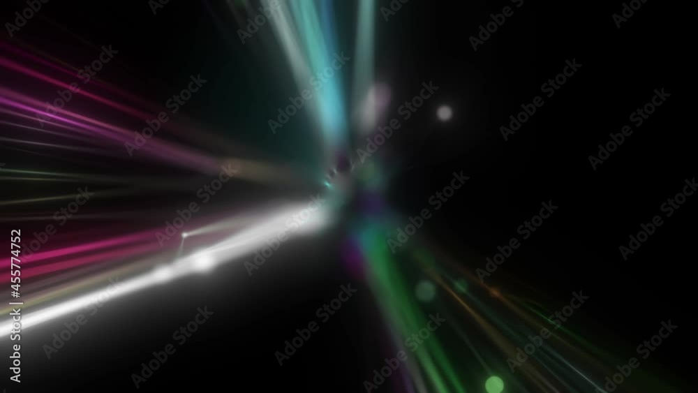 Colored laser beams are rapidly flying in different directions from one ...