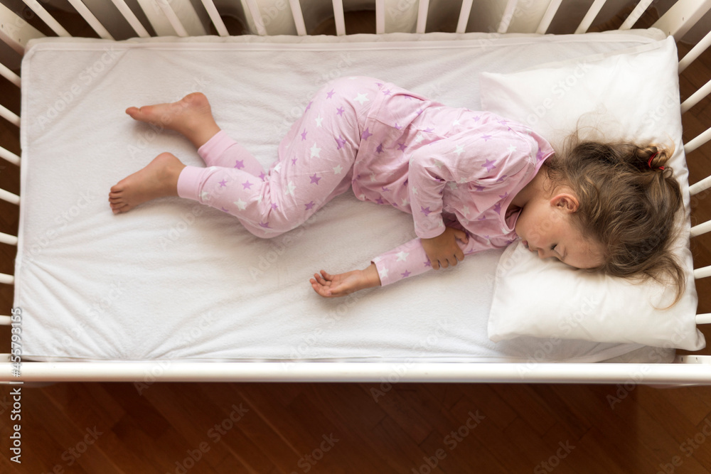 Sleeping Baby Girl In Crib
