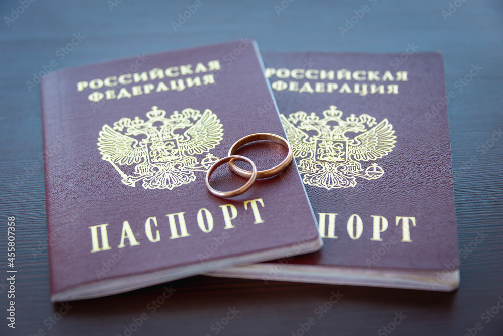 Russian passport and wedding rings. Registration of marriage, filing an ...