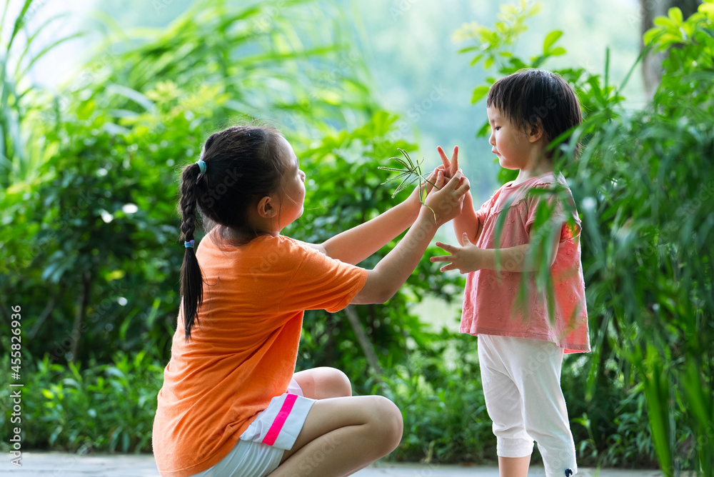 happy asian kids playing in the park Stock Photo | Adobe Stock